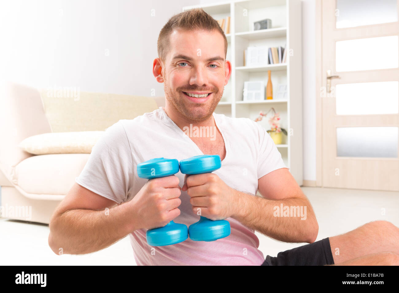 Home gym dumb bells hi-res stock photography and images - Alamy