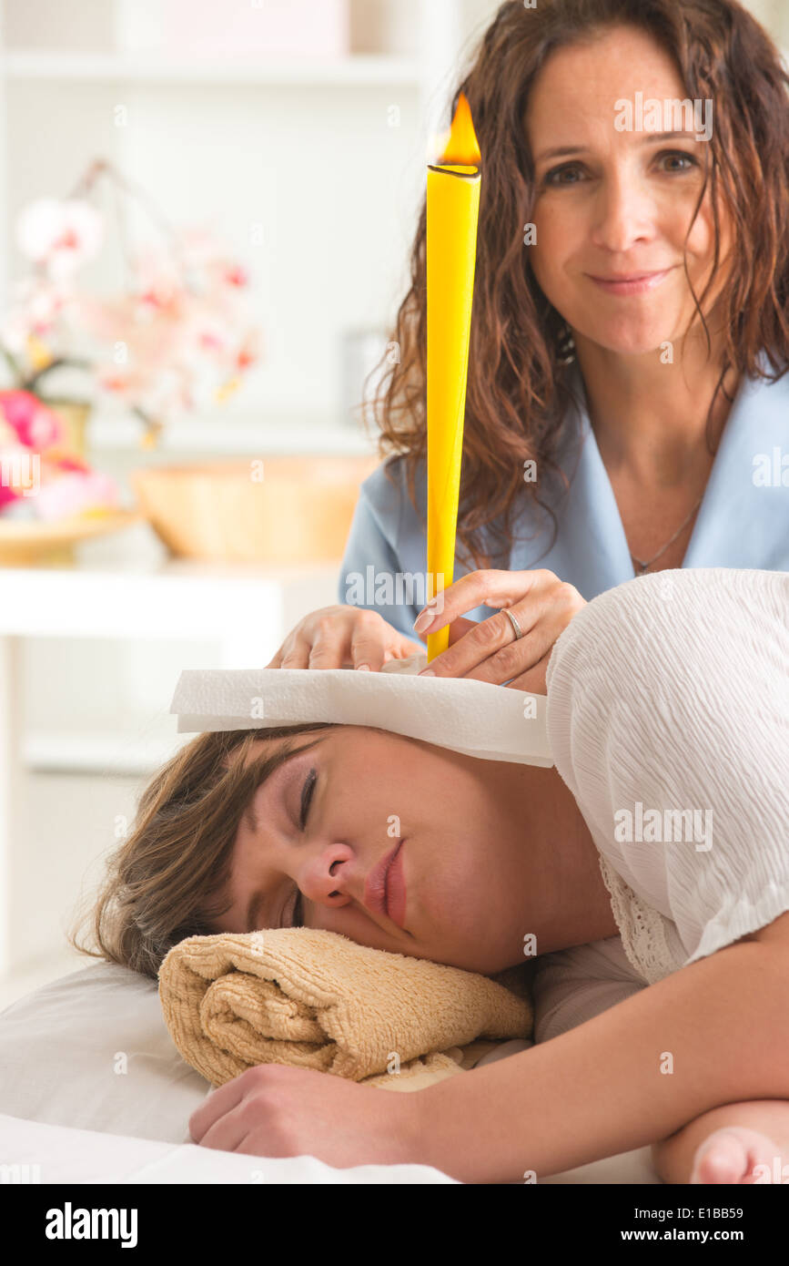 Ear candling hi-res stock photography and images - Alamy
