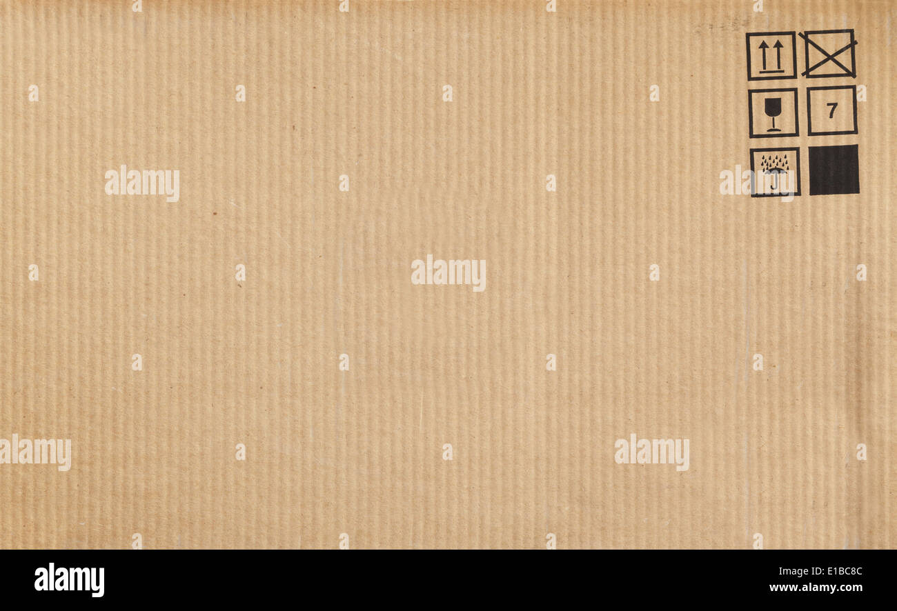 Brown cardboard with standard cargo signs, background texture Stock ...