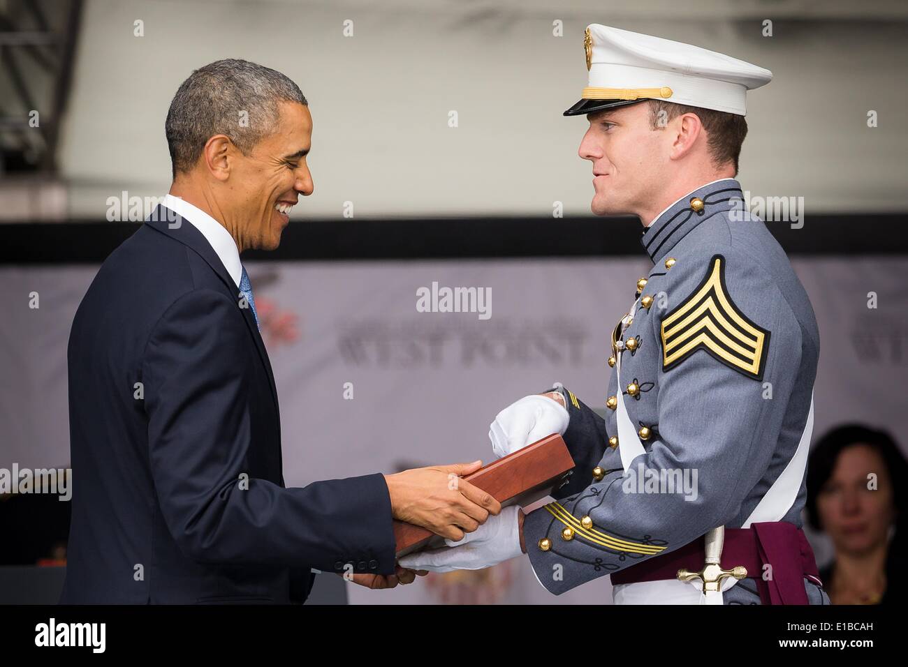 US President Barack Obama con graduates a cadet during graduation ...