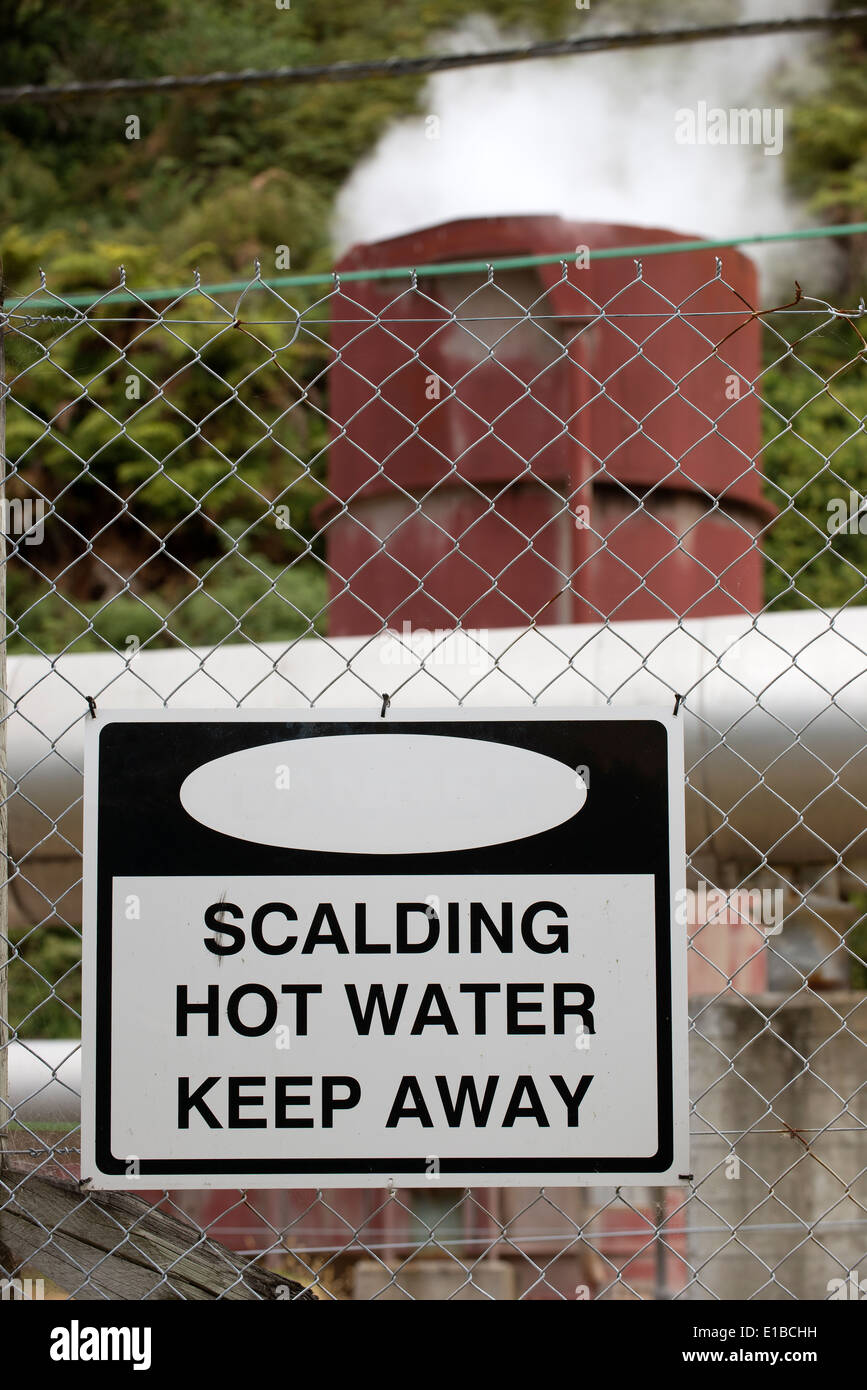 Danger notice on wire fence Scalding Water at geothermal power ...