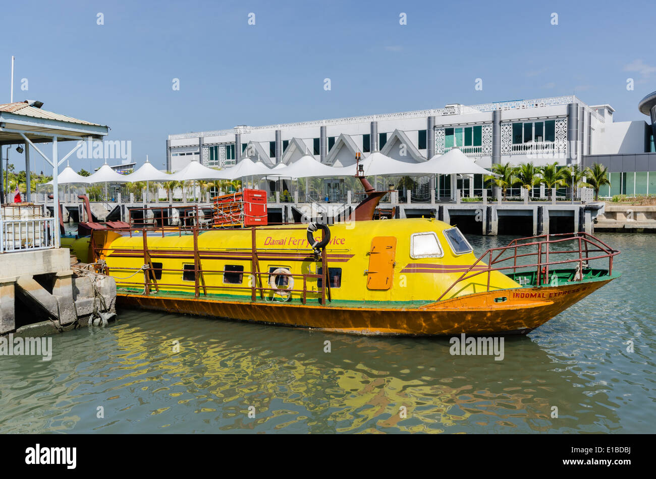 Damai Ferry Service yellow boat moored on the Melaka River in Melaka ...