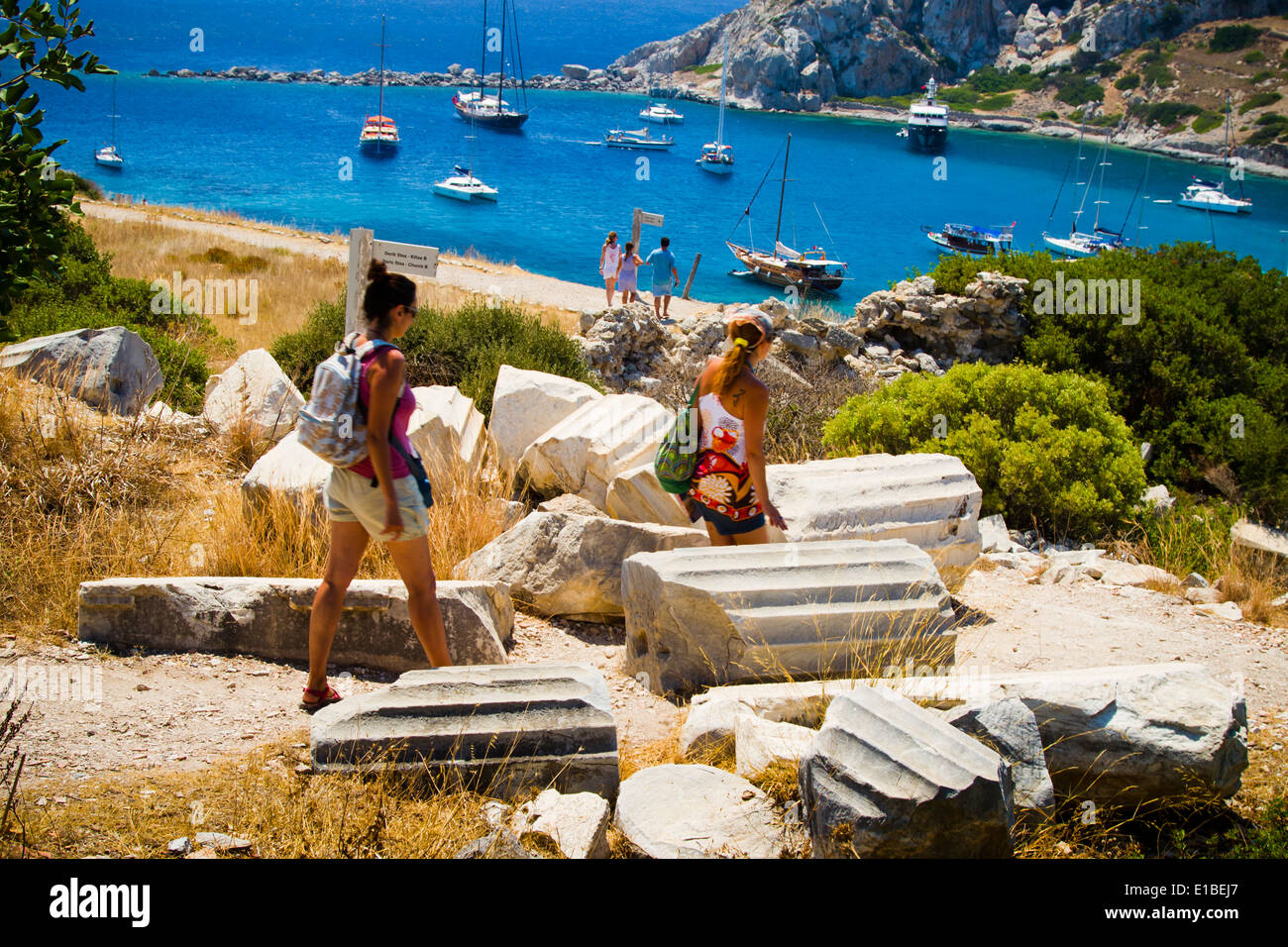 Bay and sailing ships in Knidos ancient Greek city ruins. Datca peninsula, Mugla province ...