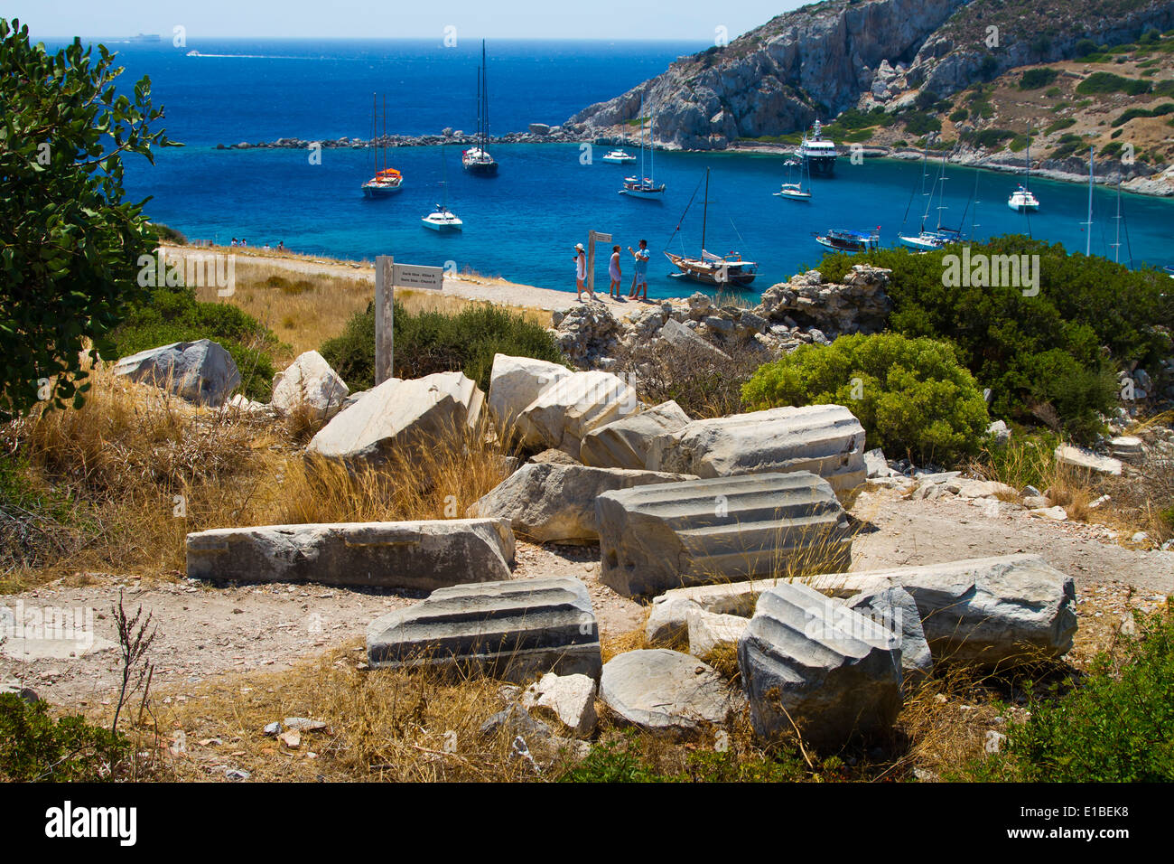 Bay and sailing ships in Knidos ancient Greek city ruins. Datca peninsula, Mugla province ...