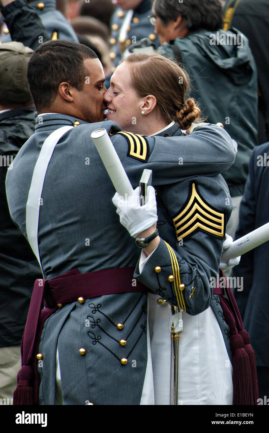 Cadets embrace at the US Military Academy in full parade dress as they ...