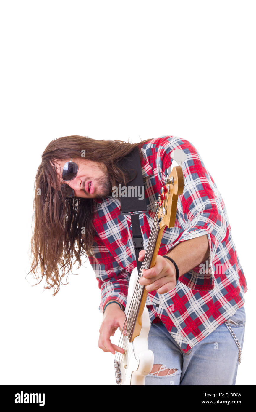 young man with face expression playing electric bass guitar, isolated ...