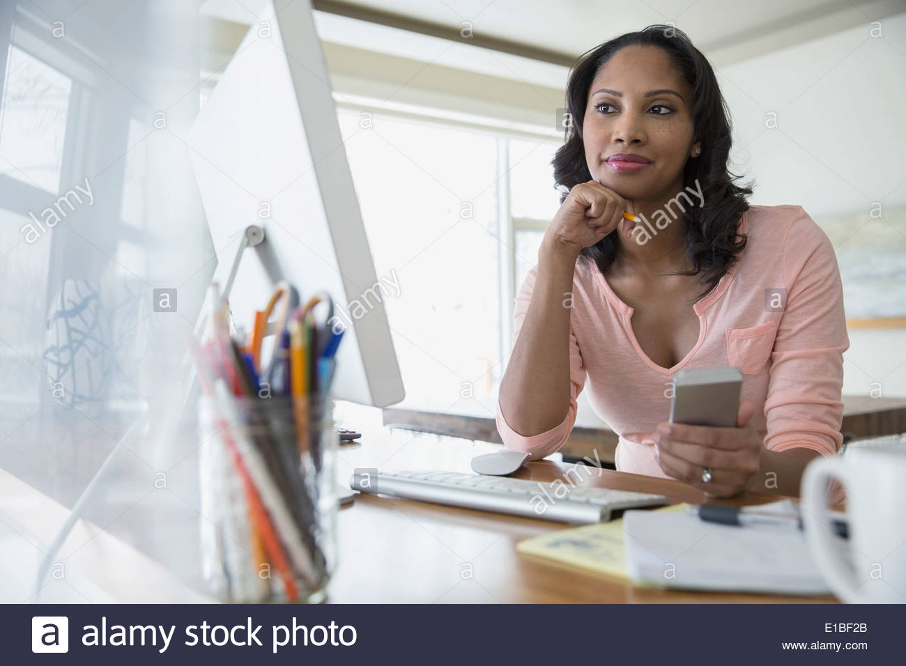 Pensive person on computer at home hi-res stock photography and images ...