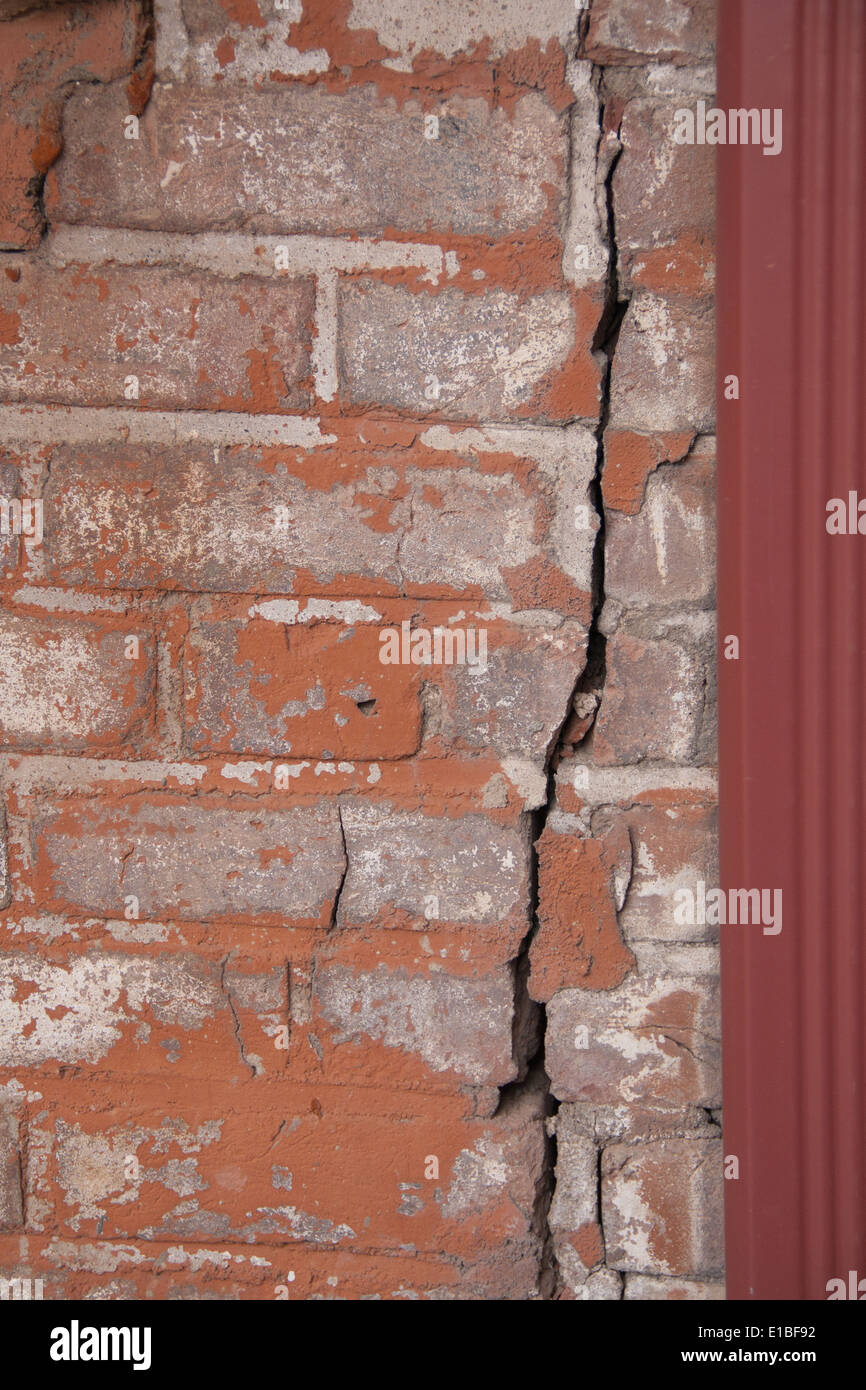 Cracked brick building facade in alley in Loveland, Colorado USA Stock ...
