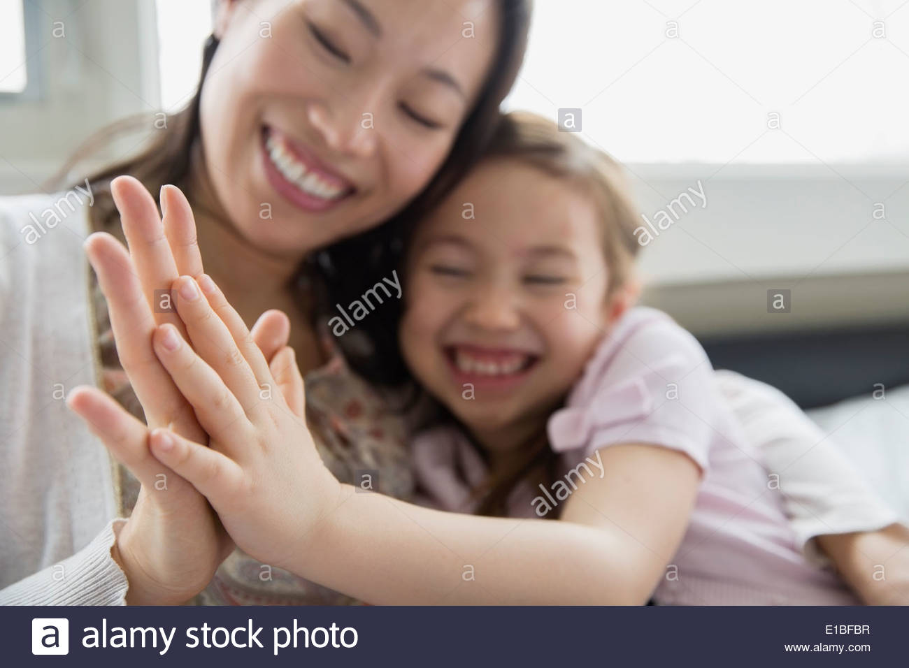 Mother touching head hi-res stock photography and images - Alamy