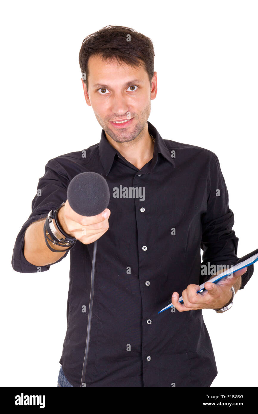 handsome young man doing interview with notes and microphone Stock ...