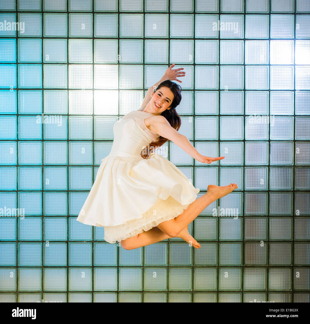 A leaping jumping happy smiling bride, UK Stock Photo - Alamy