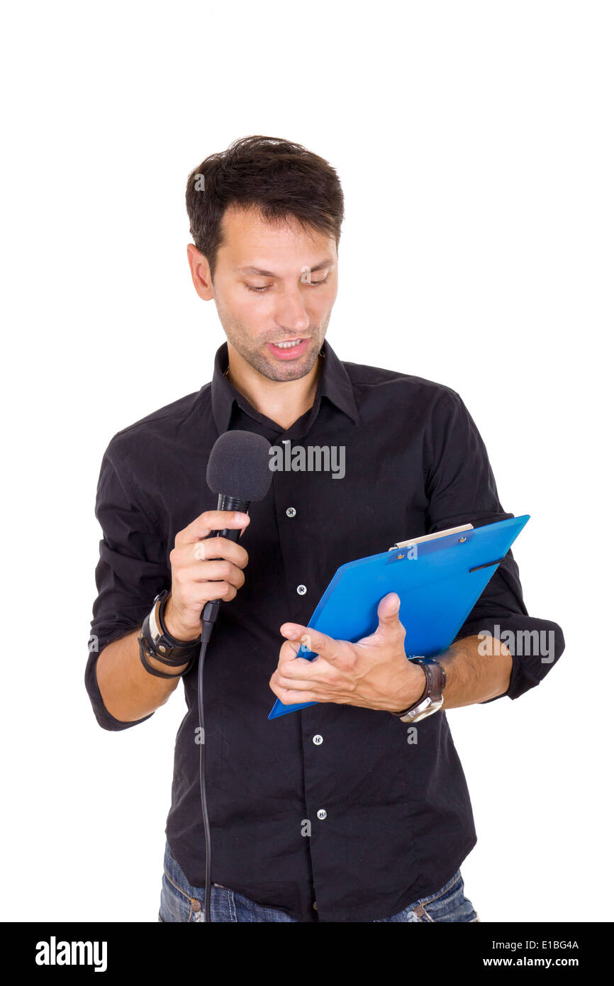 handsome young man giving speech on microphone reading notes Stock ... handsome young man giving speech on microphone reading notes Stock ...