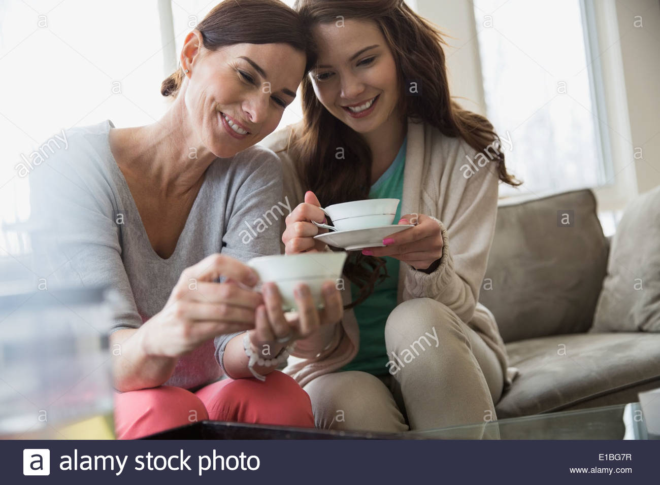 Mother daughter tea sofa hi-res stock photography and images - Alamy