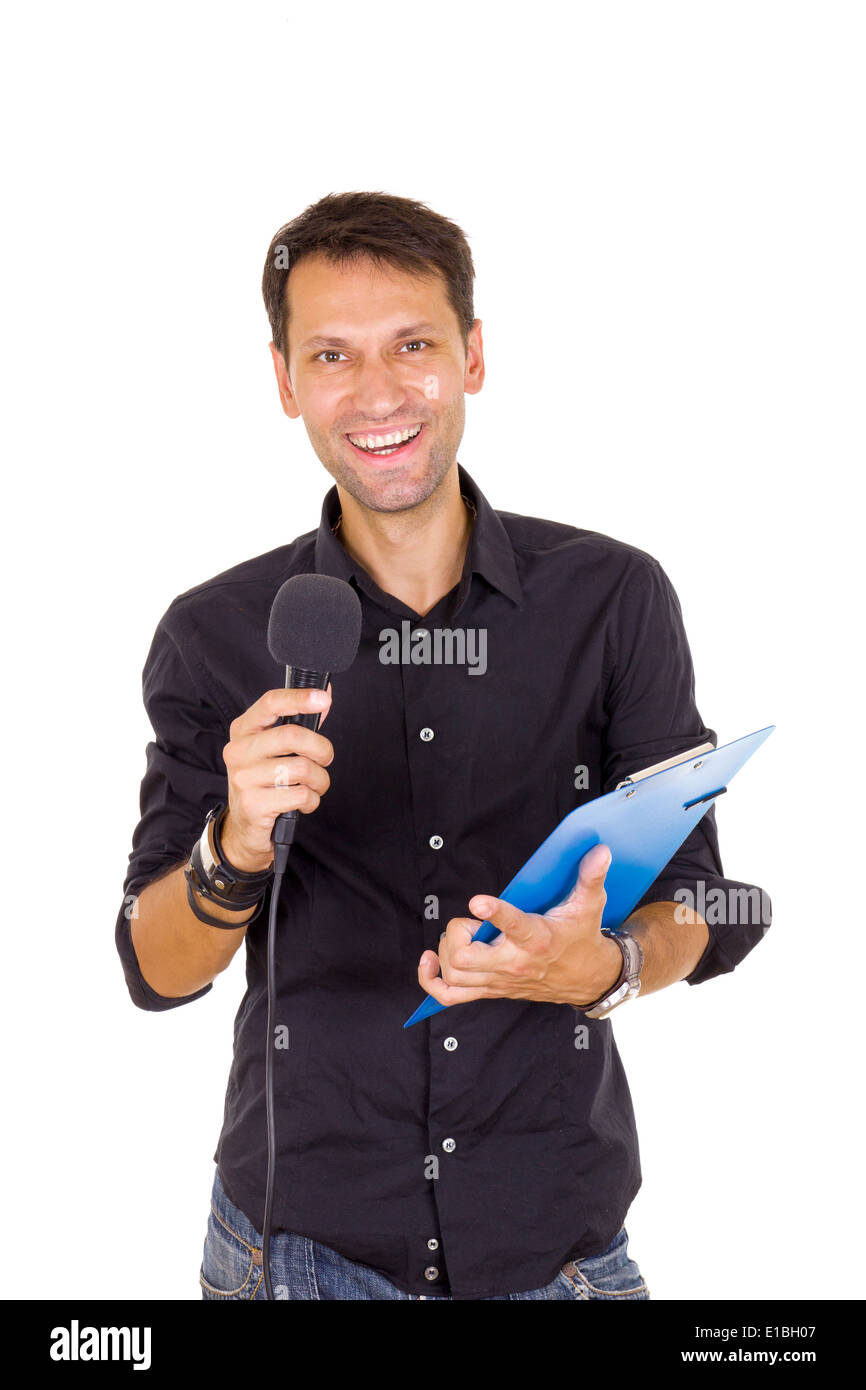 young smiling business man with notes announcing on microphone Stock ...