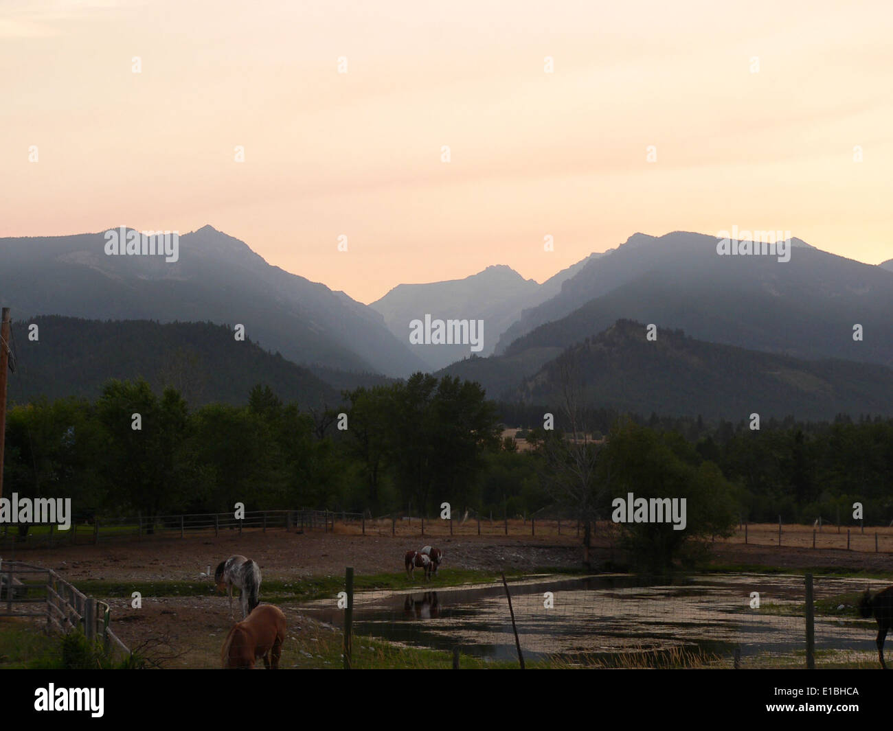 The Bitterroot Mountain Range offers a stunning sunset view, with the ...