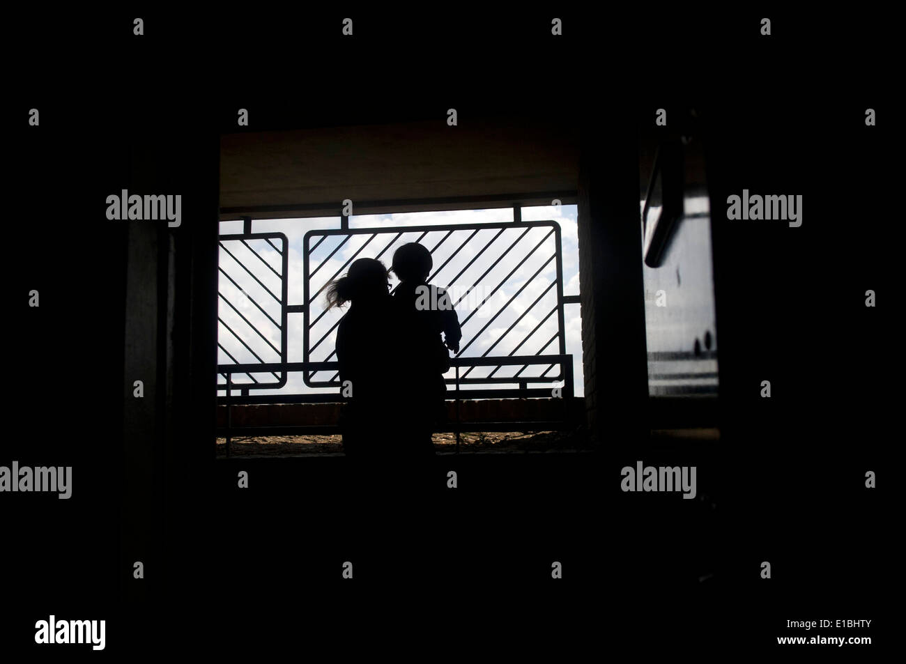 Breadline Britain mother holding child Stock Photo - Alamy
