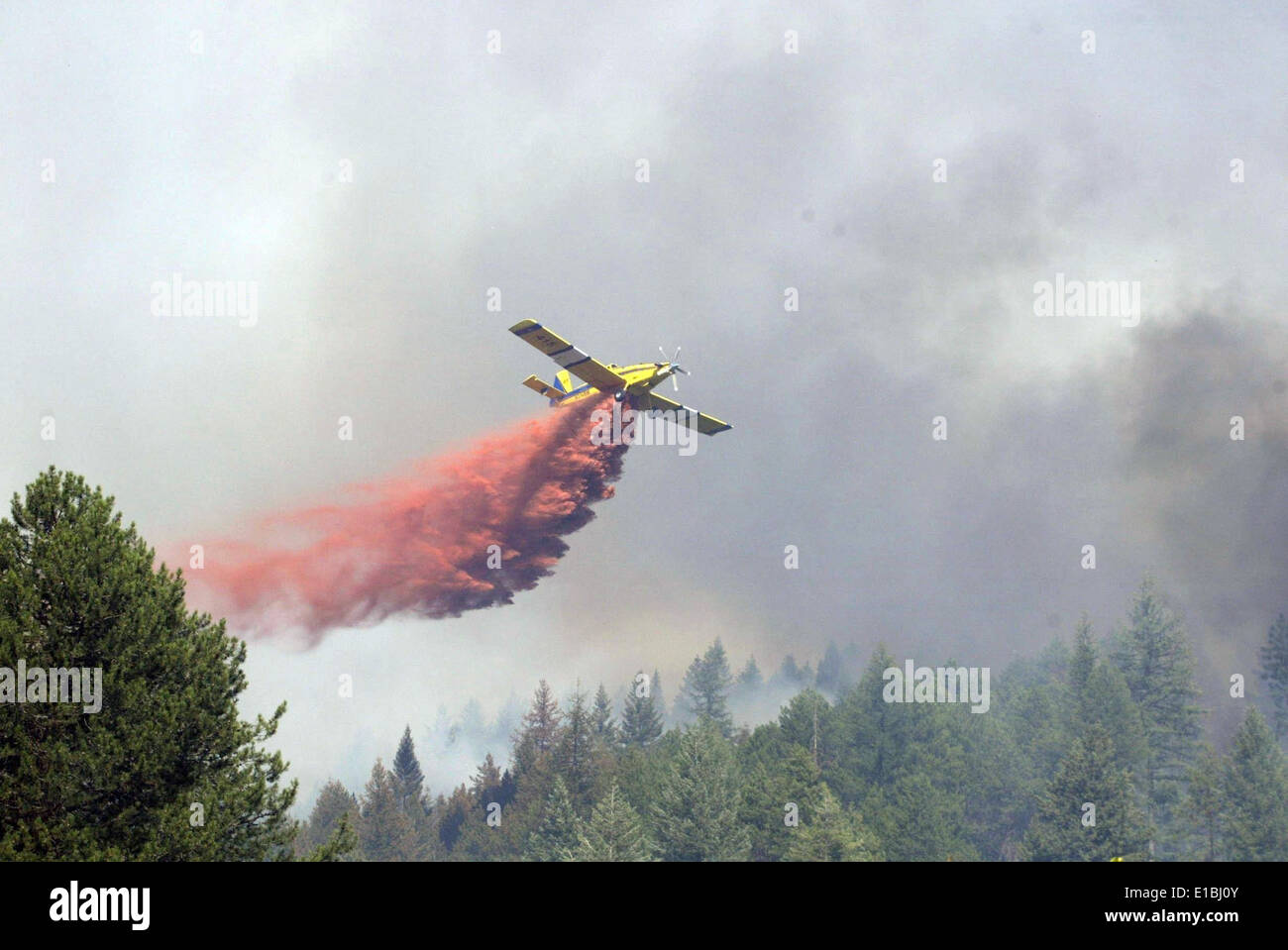 A SEAT (Single Engine Air Tanker) performs an aerial drop as part of a ...