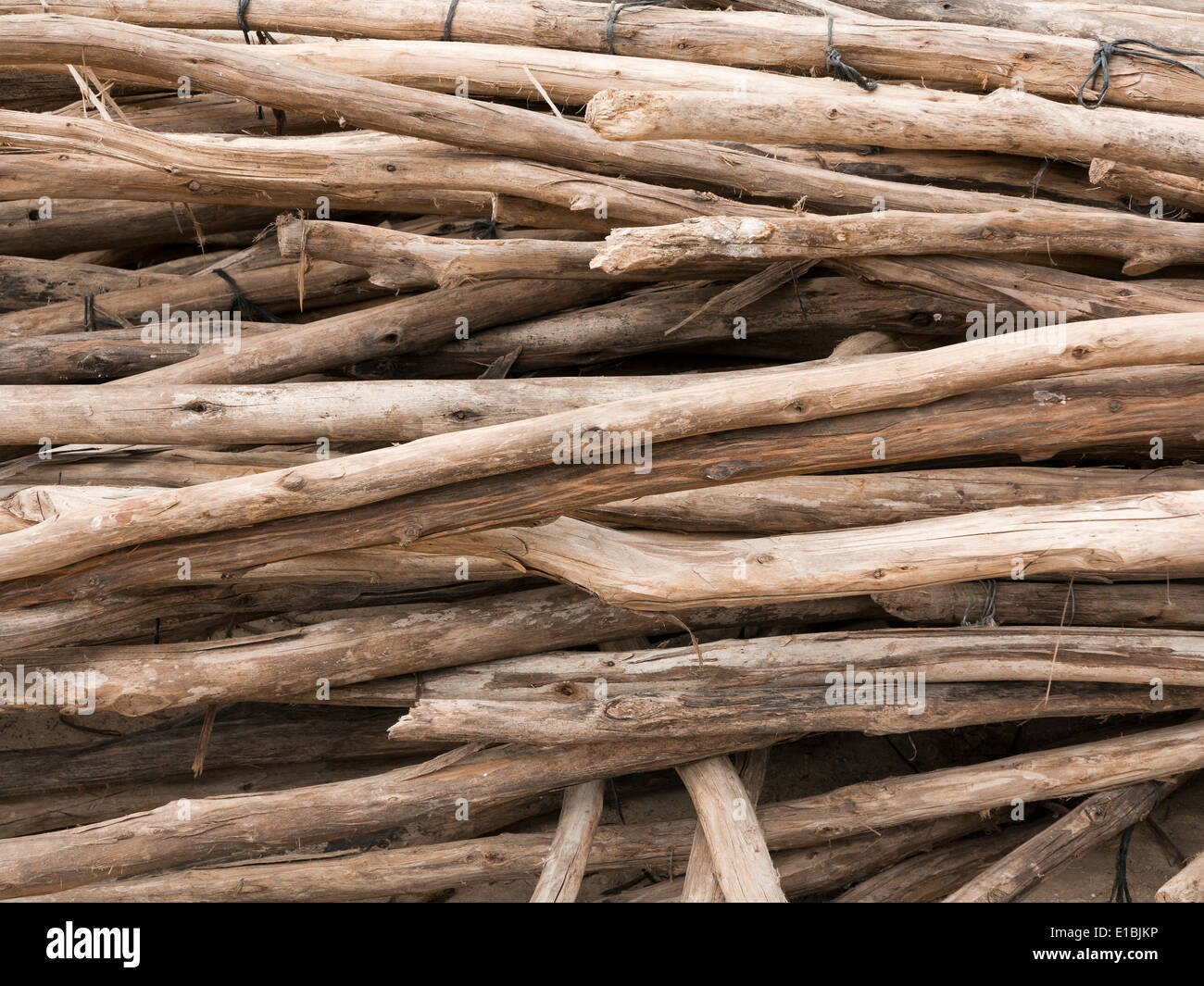 Close up of a pile of wooden props laying horizontally Stock Photo - Alamy