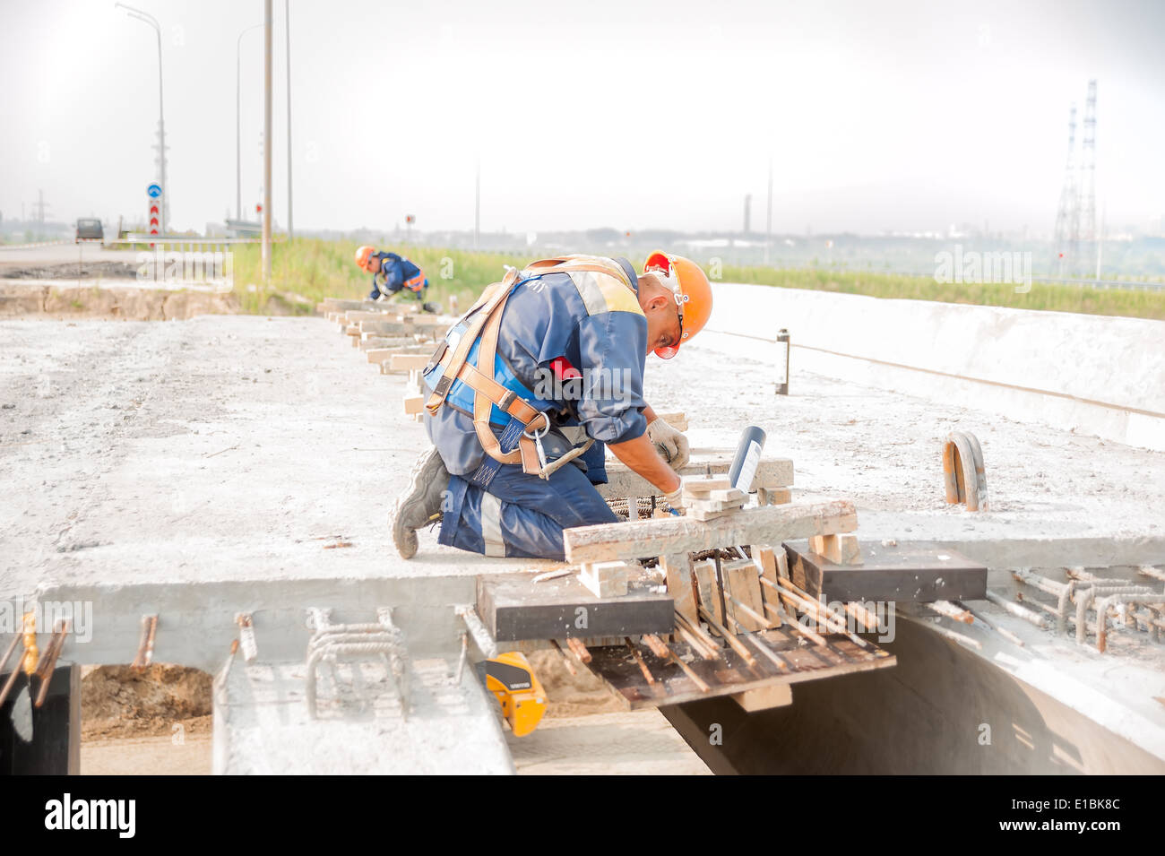 Workers on bridge construction Stock Photo - Alamy