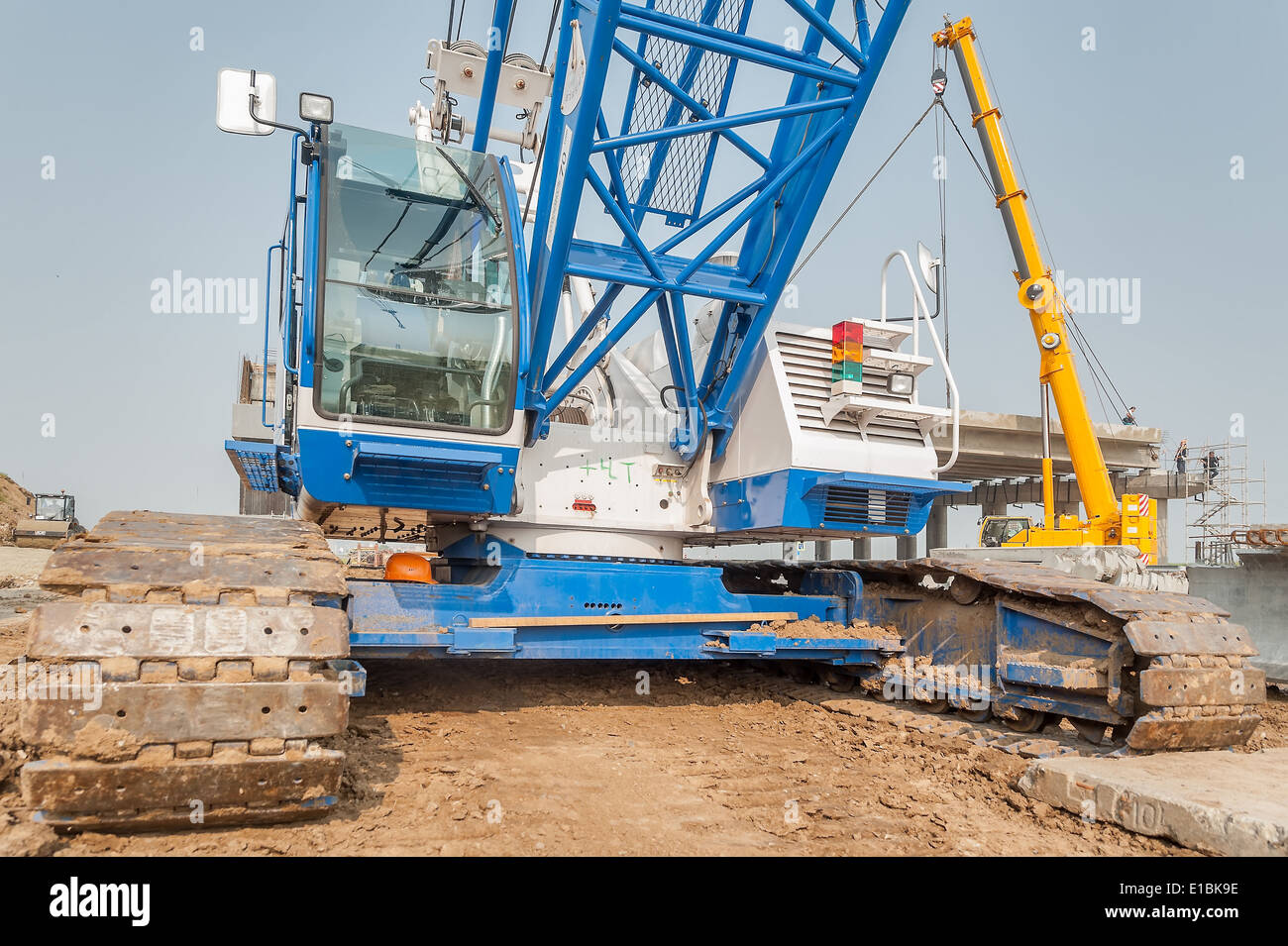 Big crane on construction site Stock Photo - Alamy