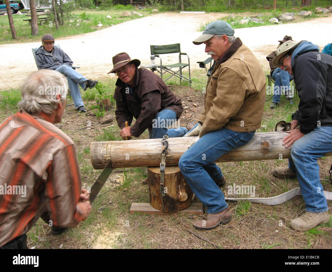 Wood sawing involves cutting wood using a saw, a traditional technique ...