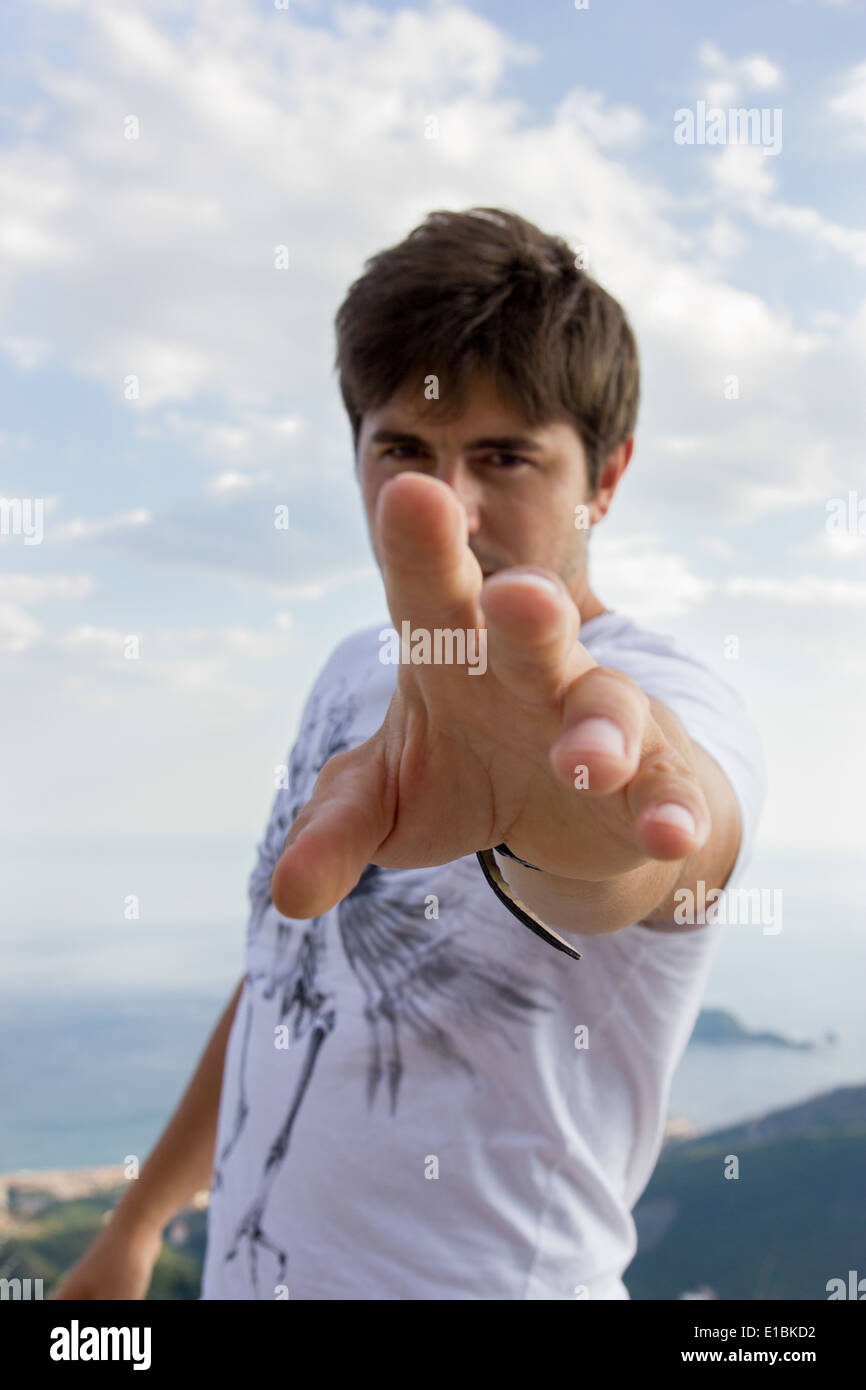 Perspective portrait reaching young hi-res stock photography and images ...