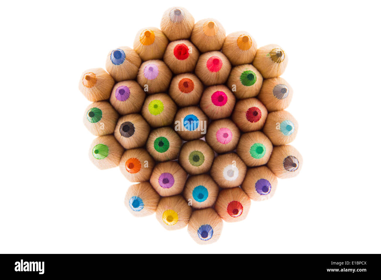 Pile of sharp wooden colored pencils, symbol of creativity, isolated on ...