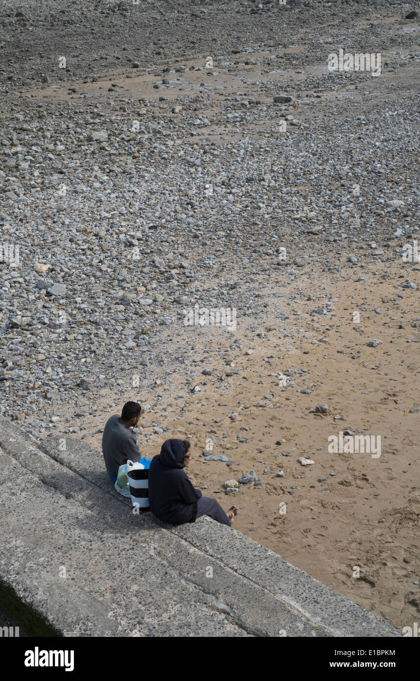 People on the beach at The Mumbles in South Wales Stock Photo - Alamy