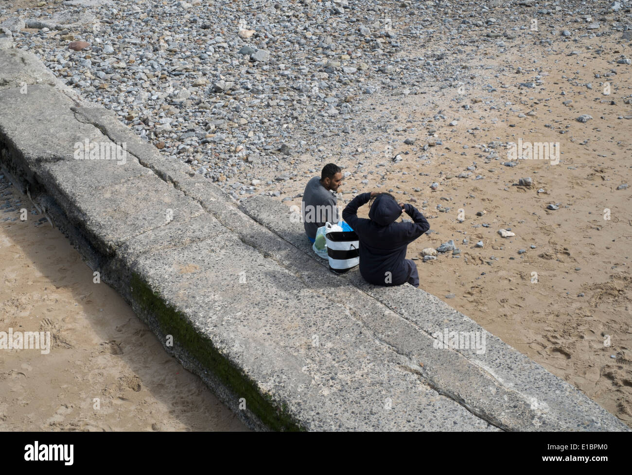 People on the beach at The Mumbles in South Wales Stock Photo - Alamy