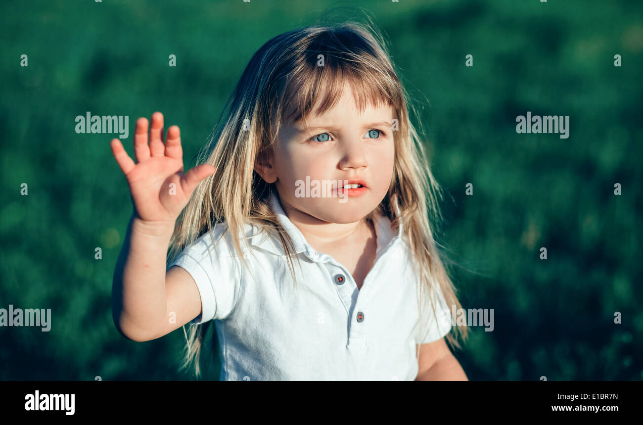 Child waving hand hi-res stock photography and images - Alamy