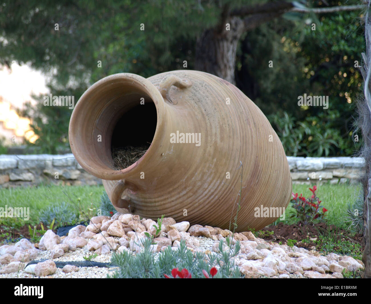 Amphora In The Garden Stock Photo - Alamy