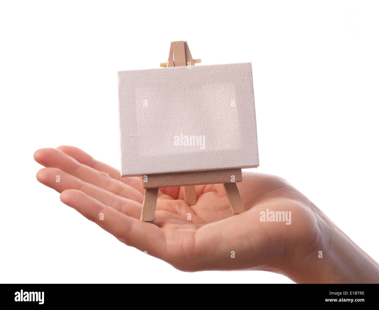 Wooden easel is holding a blank canvas hi-res stock photography and ...