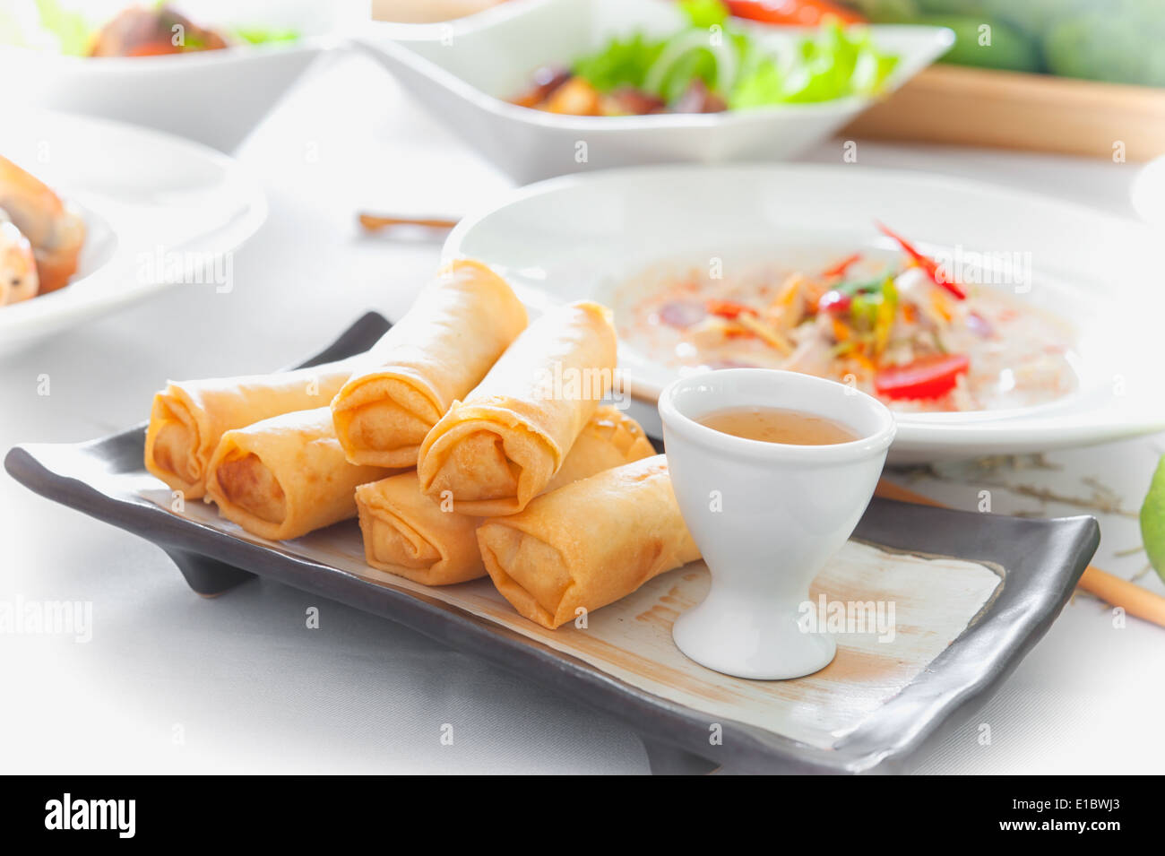 Delicious thai spring rolls with sauce on dish Stock Photo - Alamy