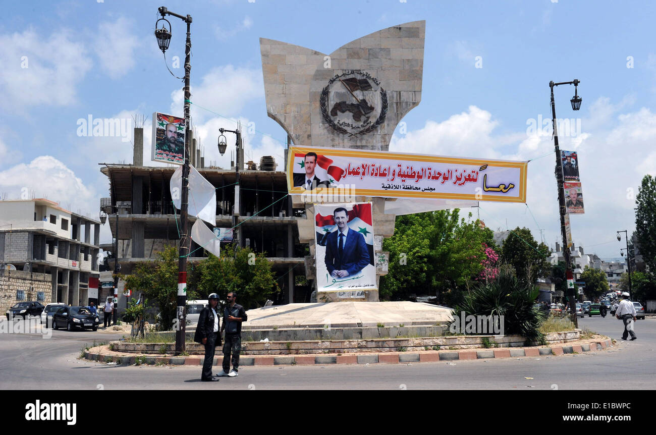 Kardaha. 26th May, 2014. Campaign posters of Syrian President Bashar al ...
