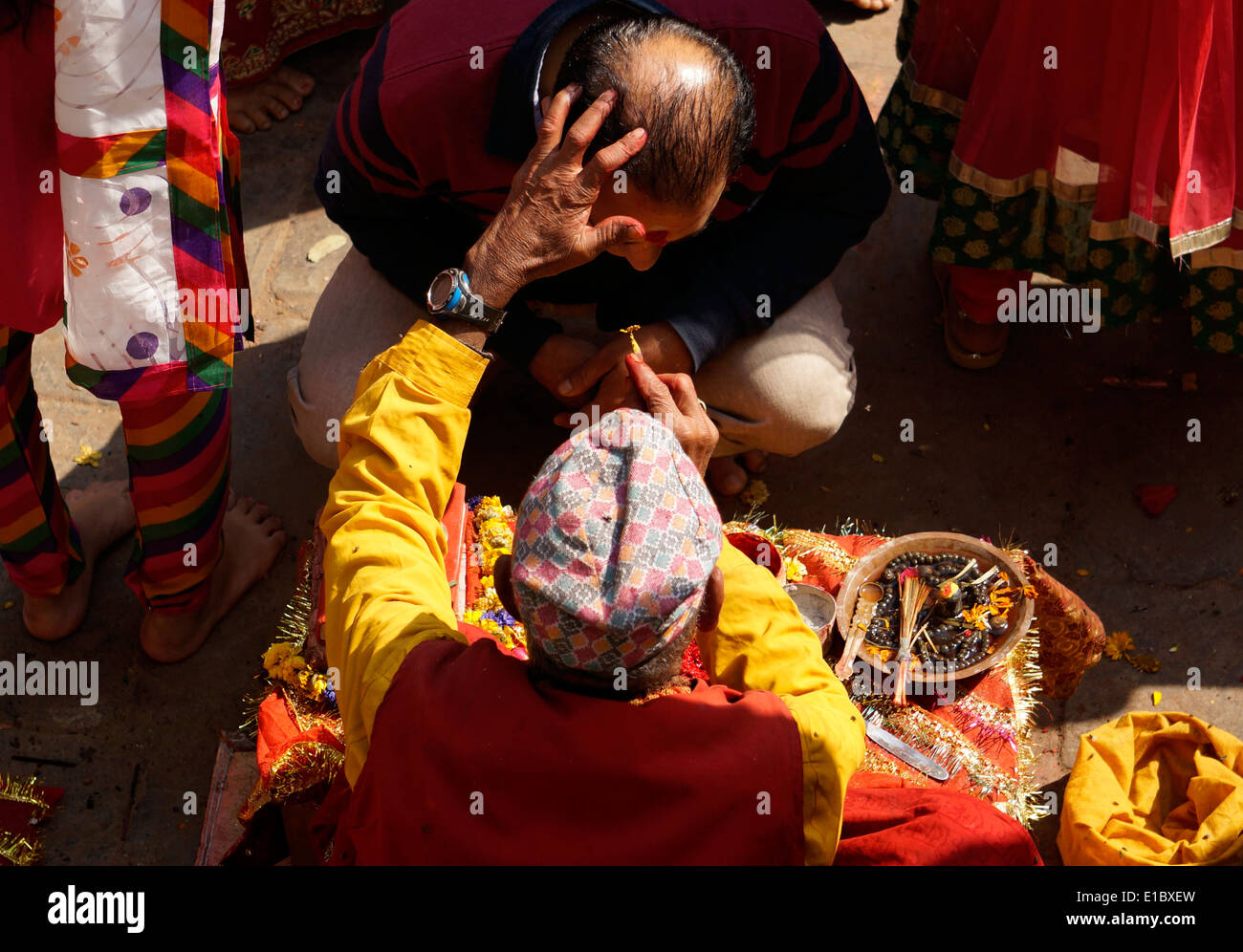 Man is getting blessing on his forehead Stock Photo - Alamy