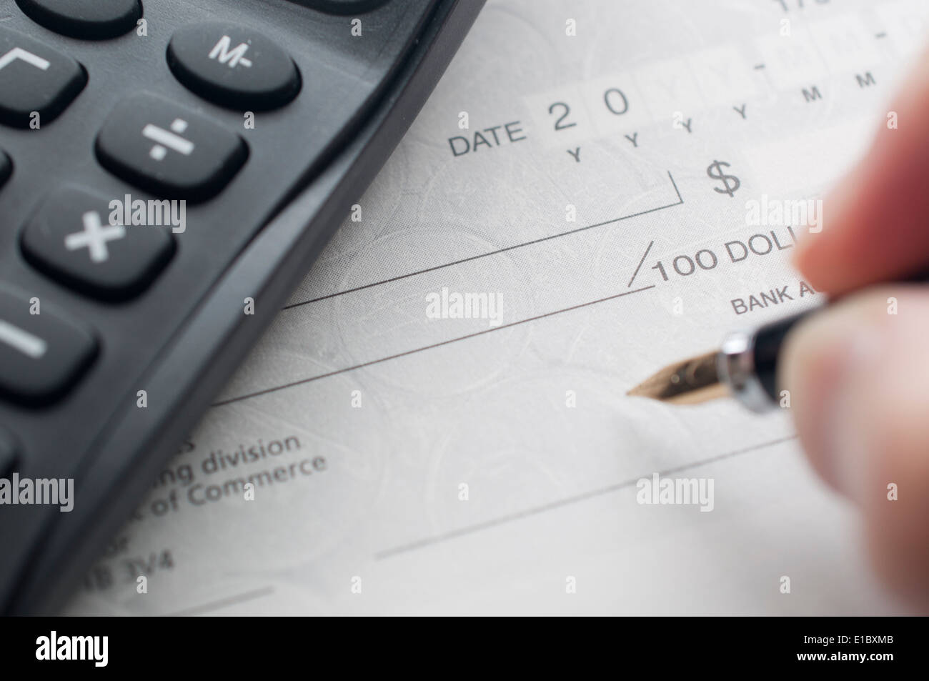 Business woman prepare writing a check Stock Photo - Alamy