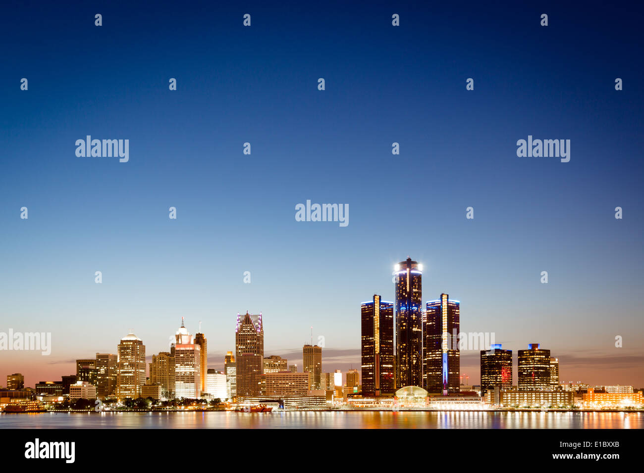 Detroit, Michigan skyline at twilight with the illuminated lights of ...