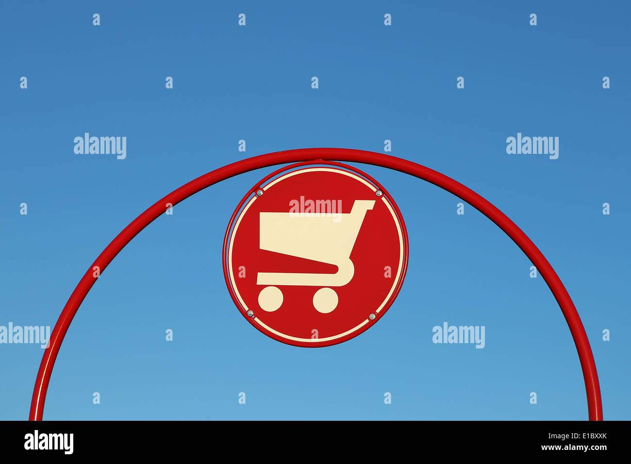 Shopping cart sign against blue sky Stock Photo - Alamy