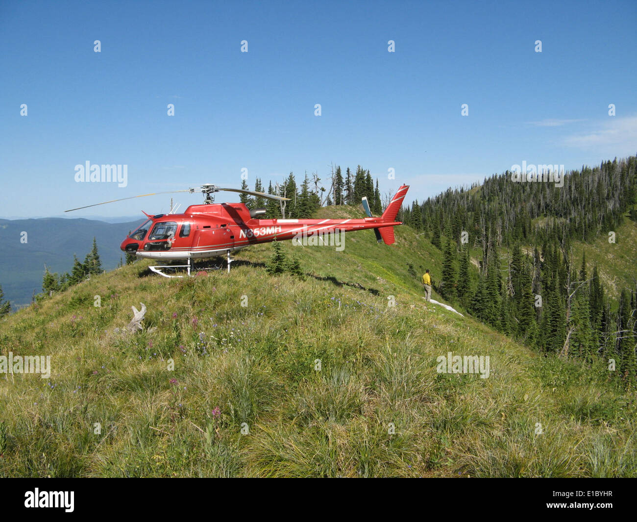 The Forest's exclusive use helicopter setting up a portable radio ...