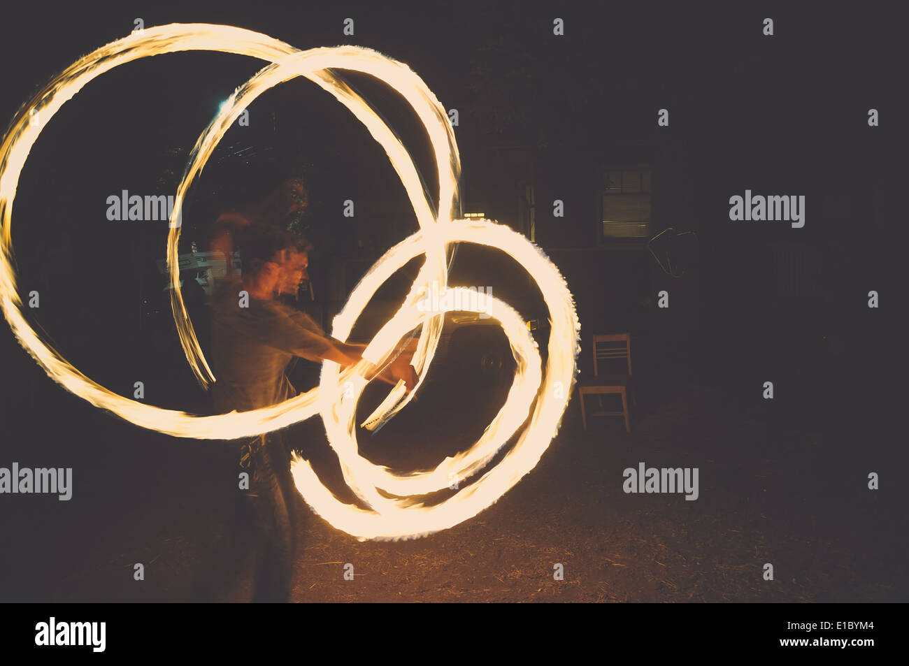 Motion of fire spinning through the air Stock Photo - Alamy