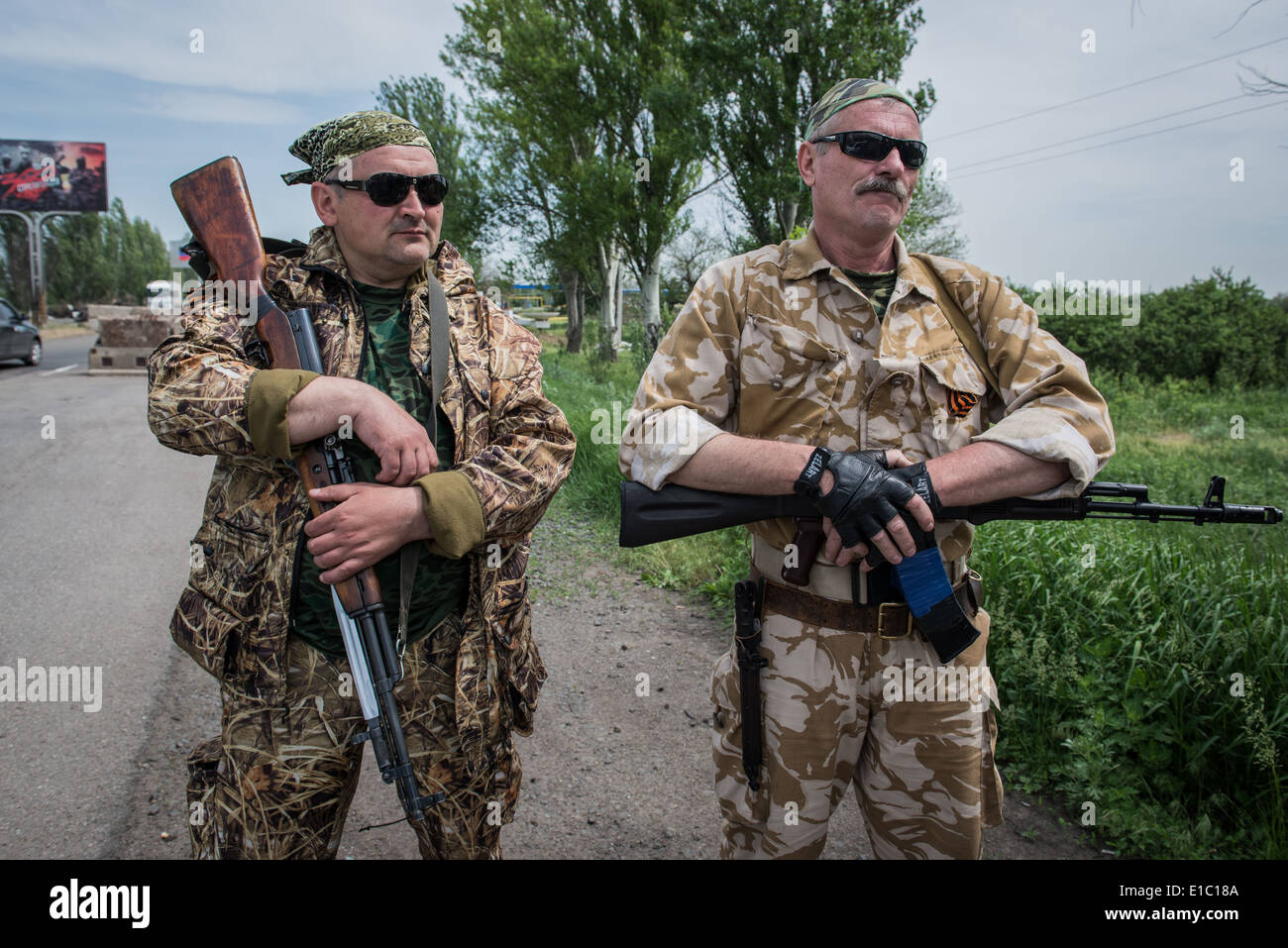 Pro-Russian militia checkpoint on the road near Donetsk during 2014 ...