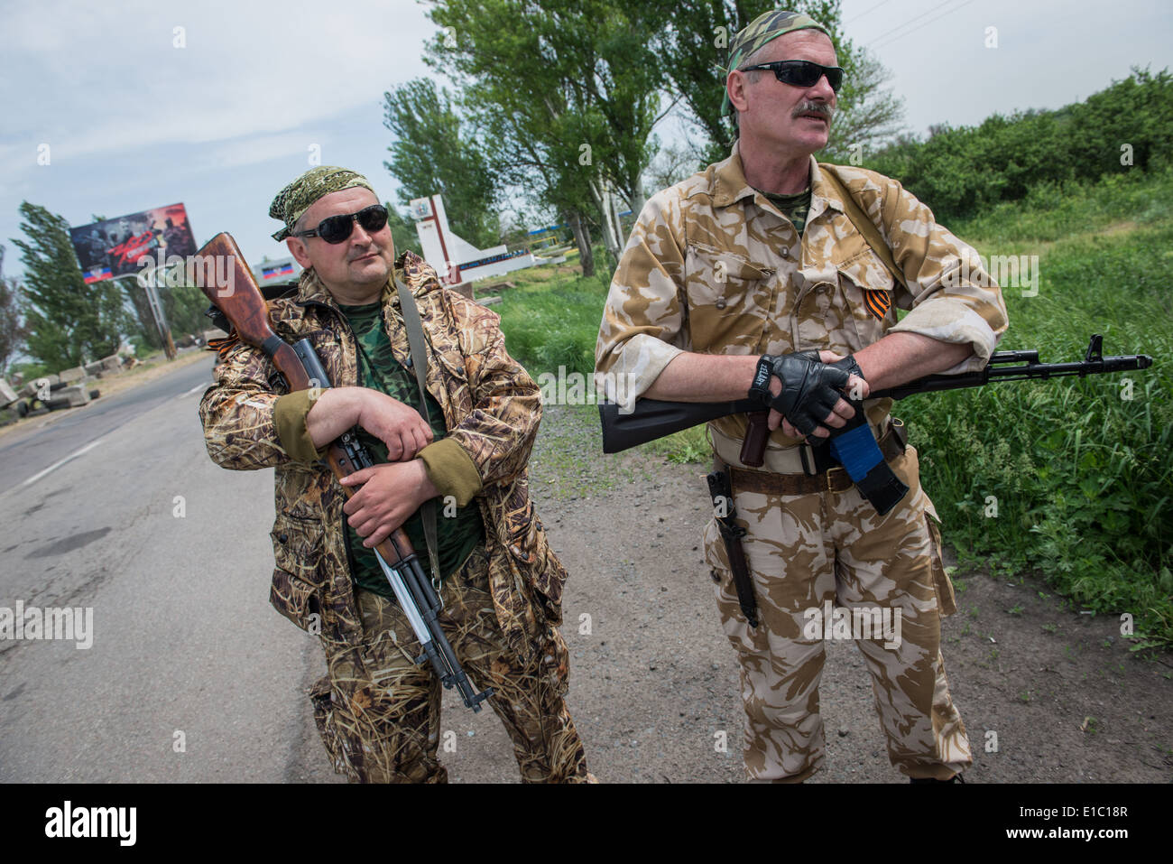 Pro-Russian militia checkpoint on the road near Donetsk during 2014 ...