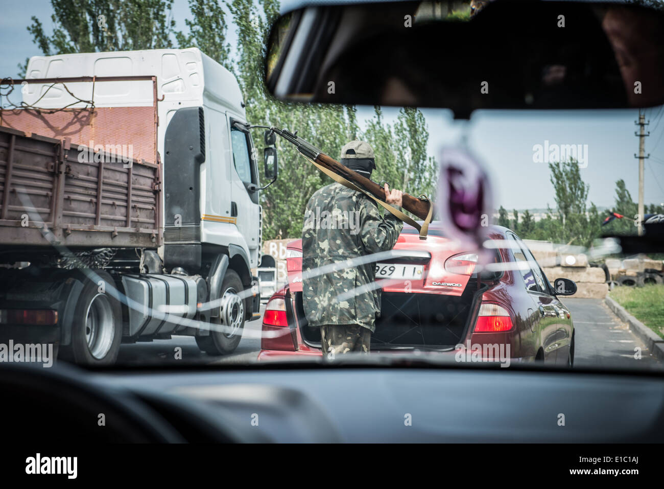 Pro-Russian militia checkpoint on the road near Donetsk during 2014 ...