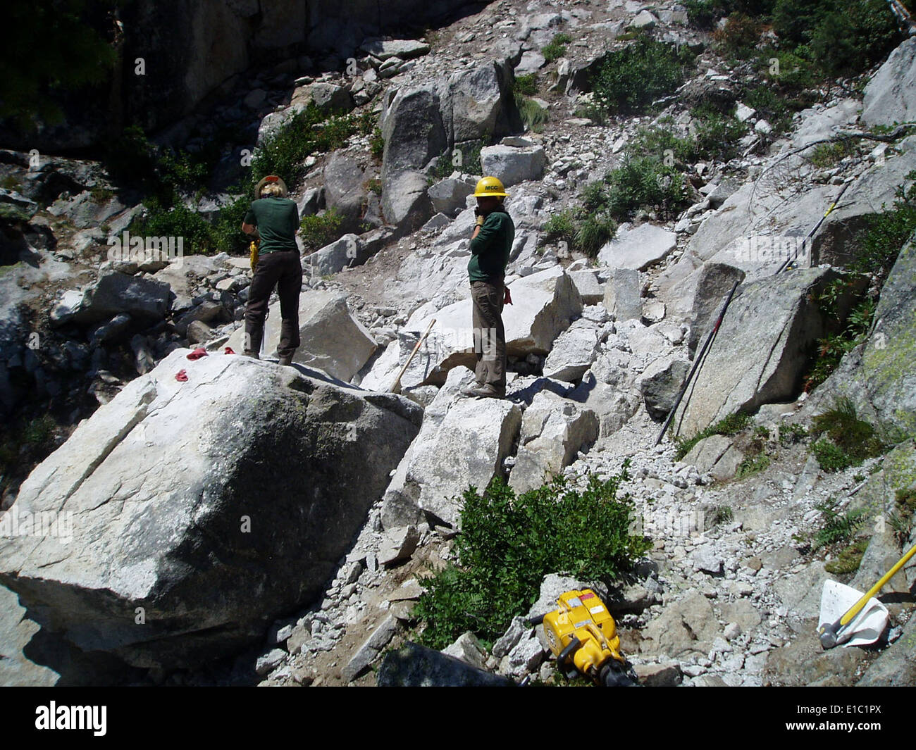 This image shows large rocks being broken apart, possibly during a ...