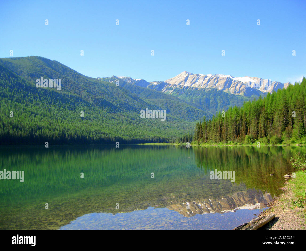 A view of the Great Northern Railway behind Stanton Lake in Flathead ...