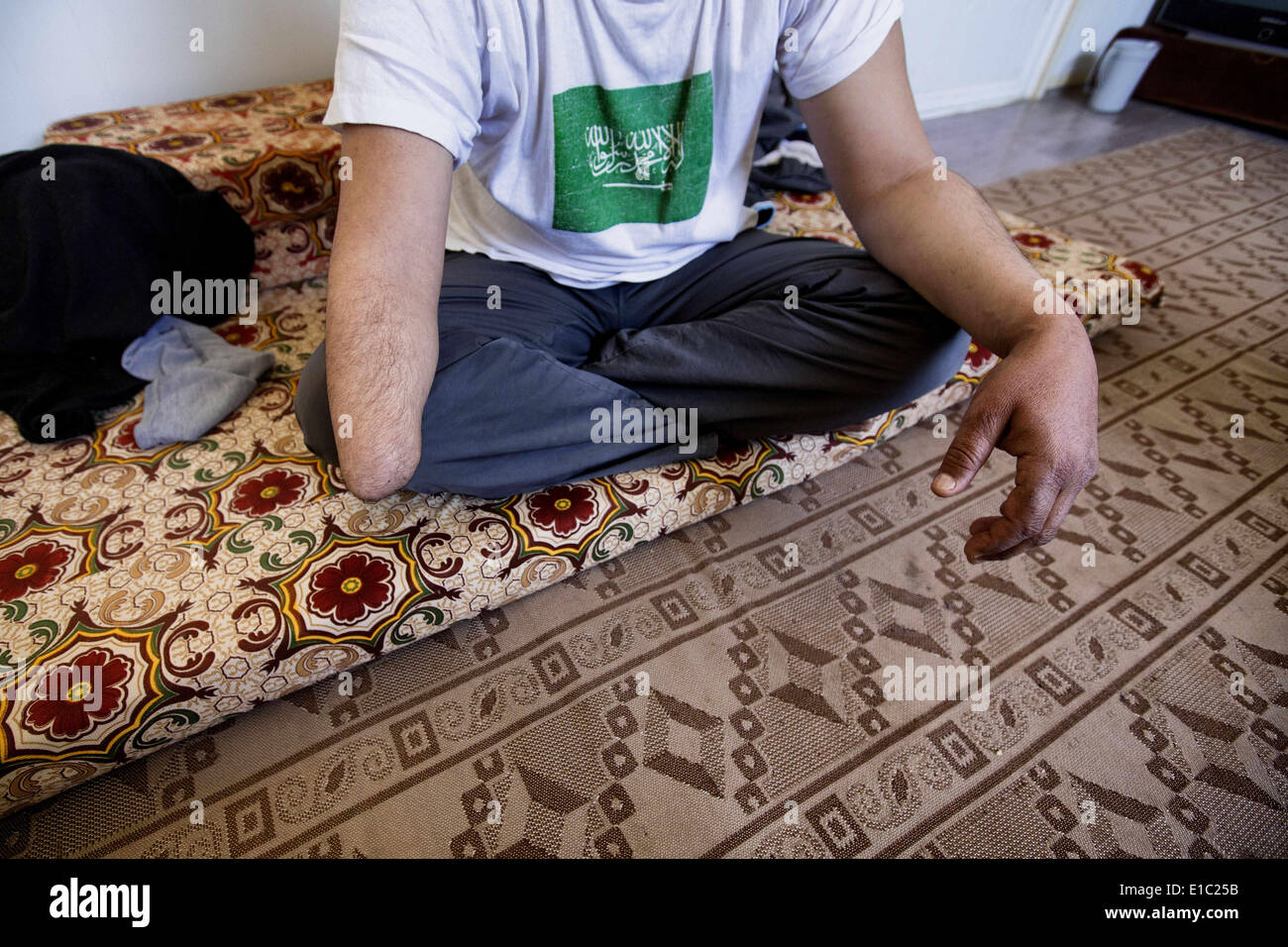 Al Mafraq, JORDAN. 8th Feb, 2014. A hand amputee who preferred that his ...