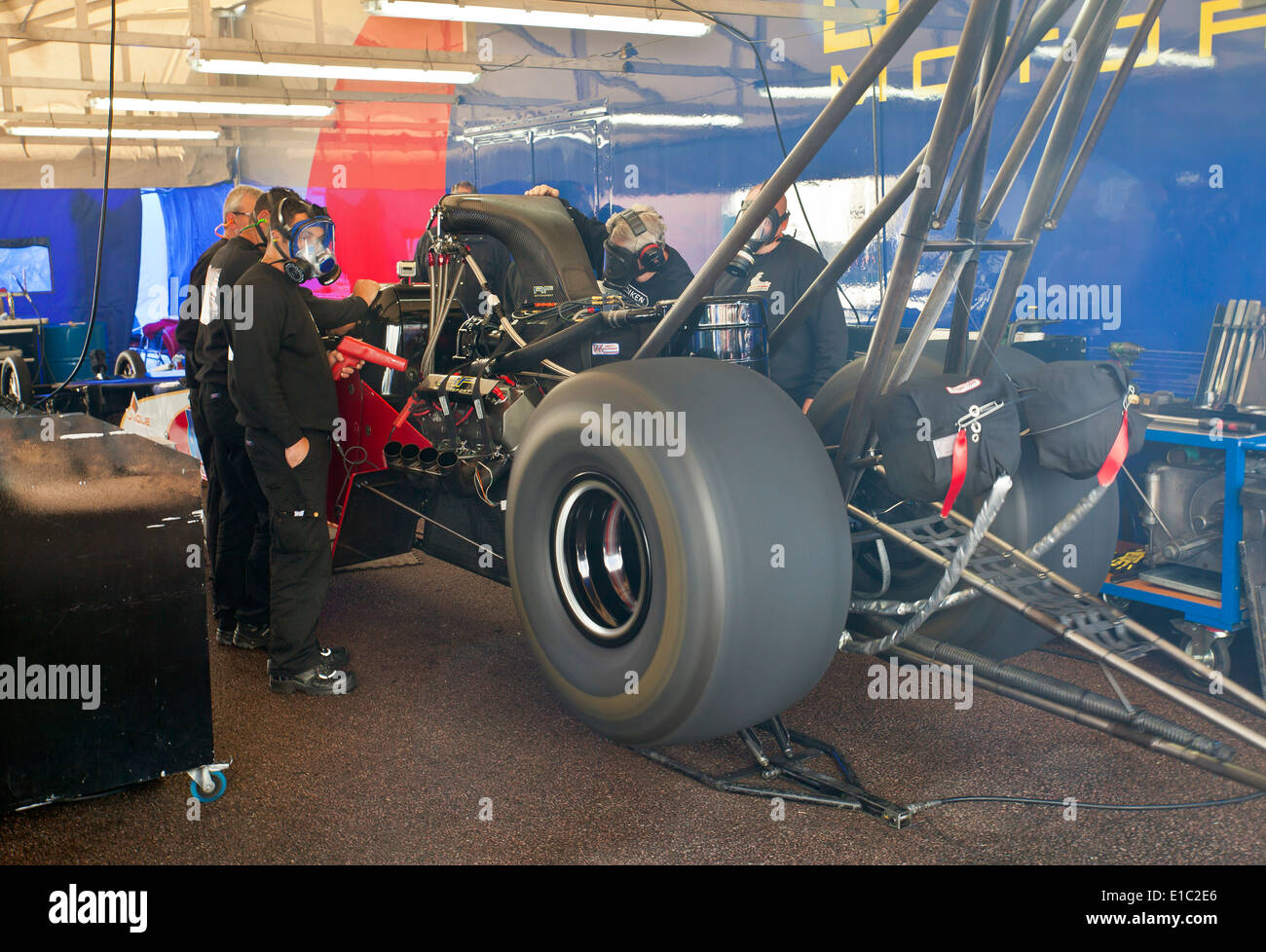 Crew working on a Top Fuel dragster at Santa Pod Stock Photo - Alamy
