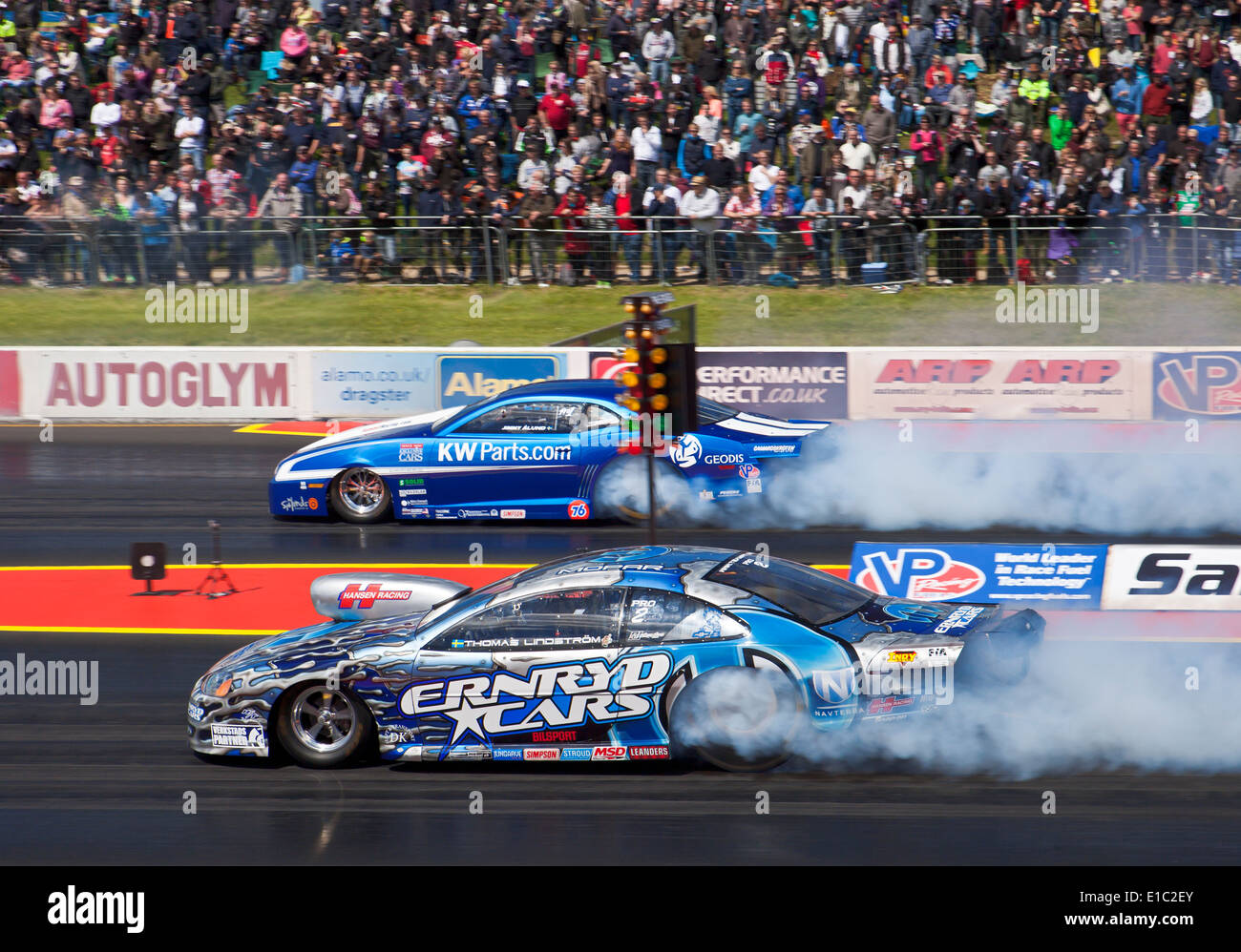 Pro Stock cars drag racing at Santa Pod. Thomas Linstrom nearside Jimmy ...