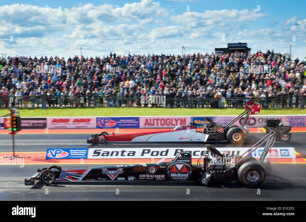 Top Fuel drag racing at Santa Pod. Urs Ebacher nearside Tethys far side ...