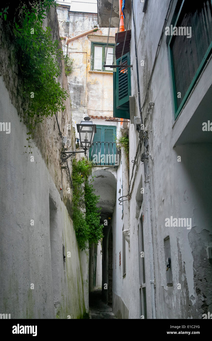 Narrow laneway with whitewashed houses in Amalfi, Italy Stock Photo - Alamy
